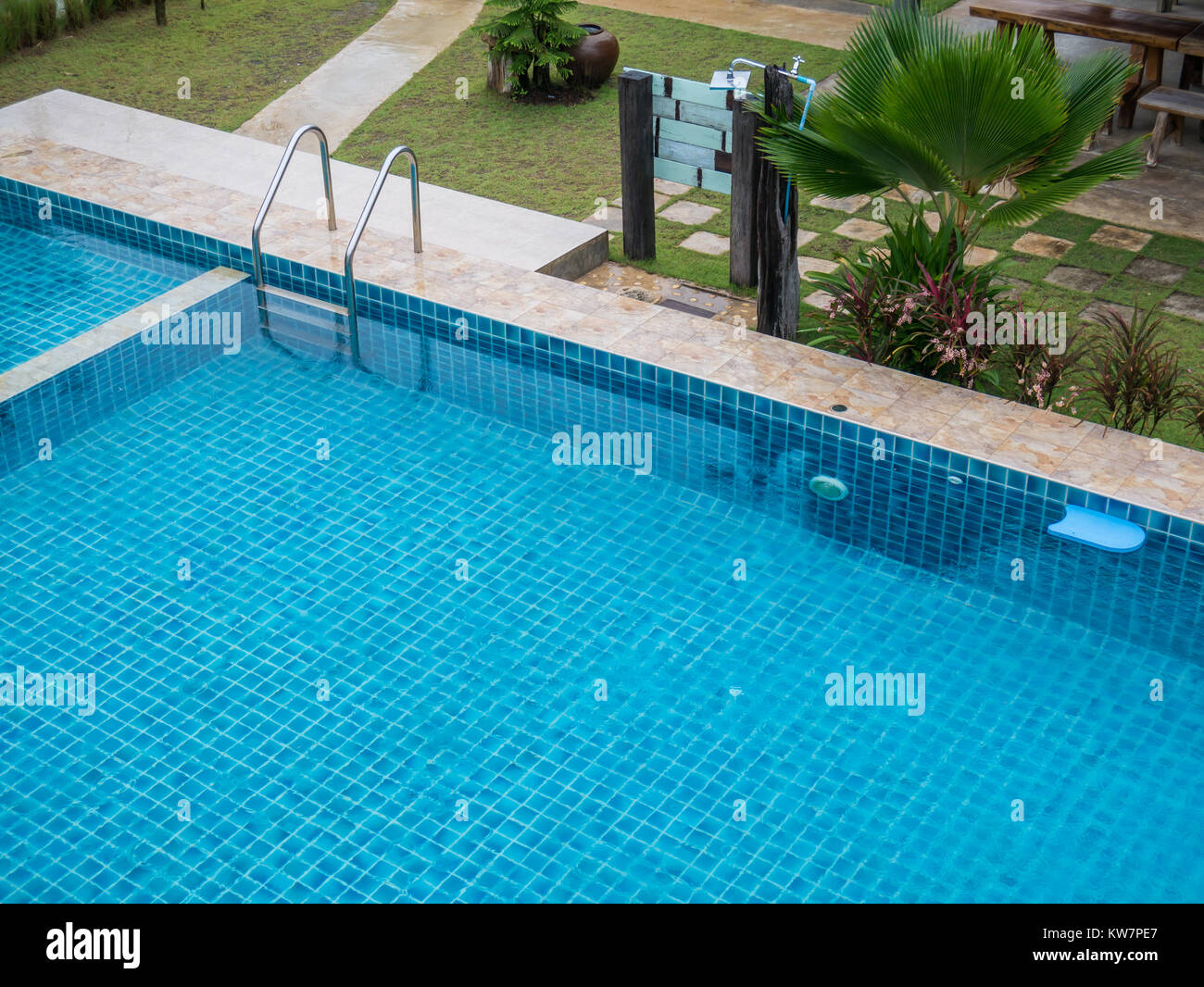 Swimmimg pool in raining day from high view Stock Photo - Alamy
