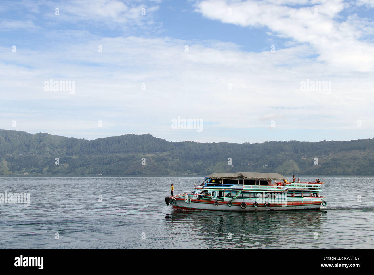 Traditional ferry boat on the lake Samosir in Indonesia Stock Photo - Alamy