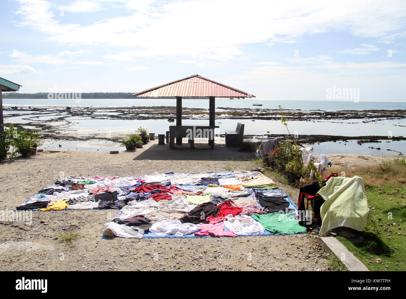 Wet clothes on the Pantai Sorake beach on the Nias island, Indonesia ...