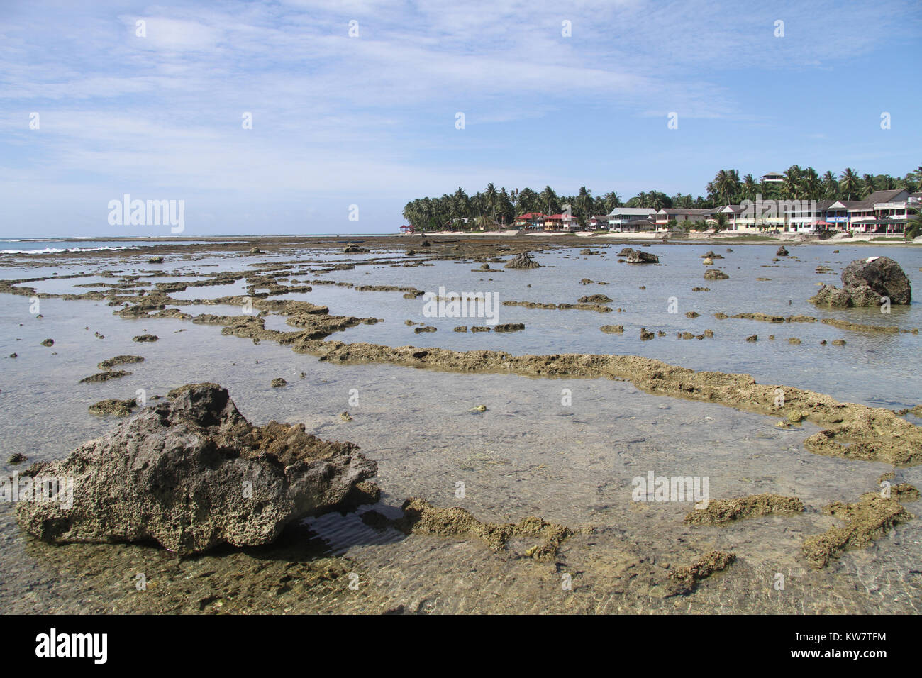 Big rock and low tide on Pantai Sorake beach in Nias island, Indonesia ...