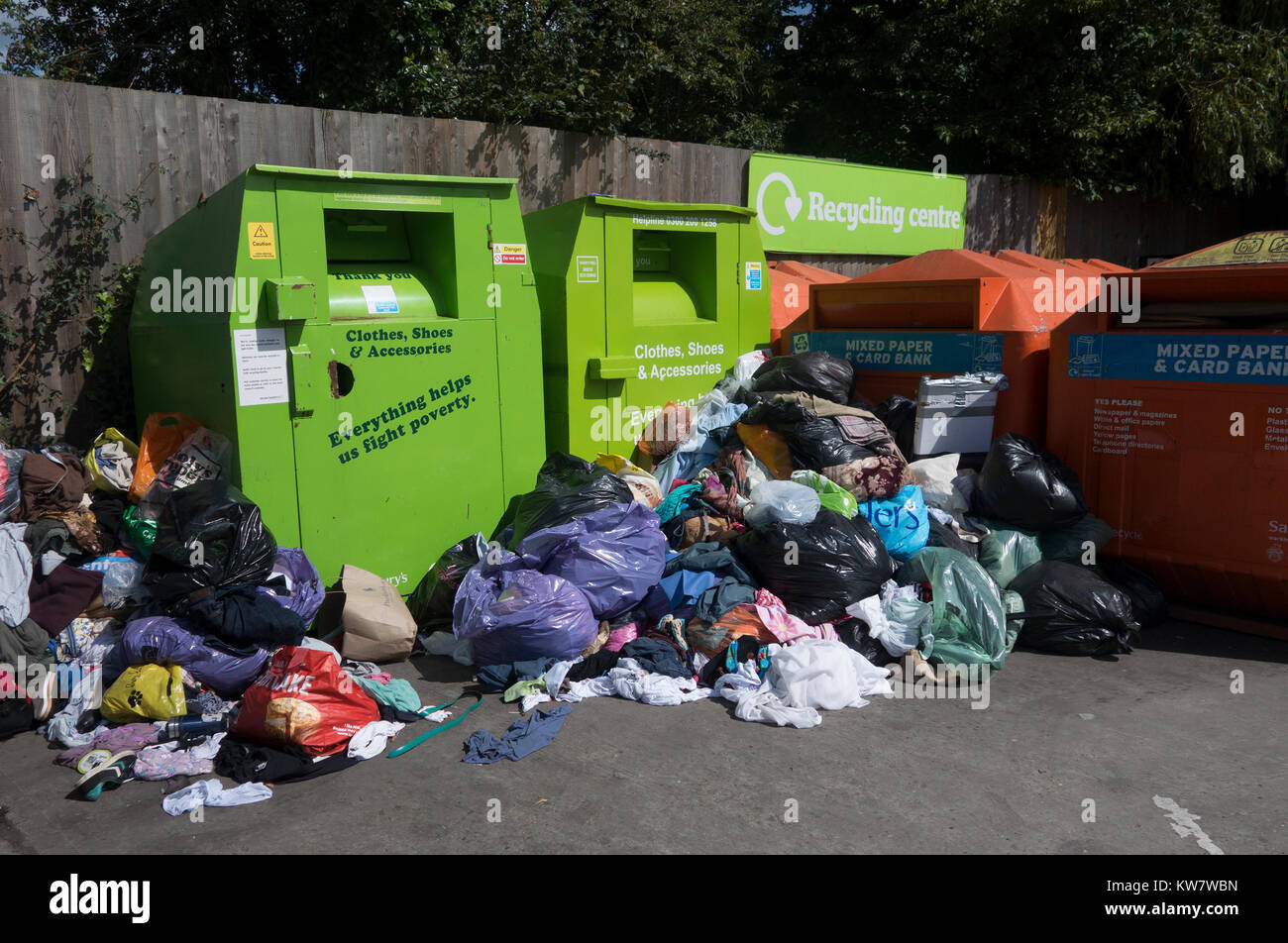 Overflowing clothes bank hi-res stock photography and images - Alamy