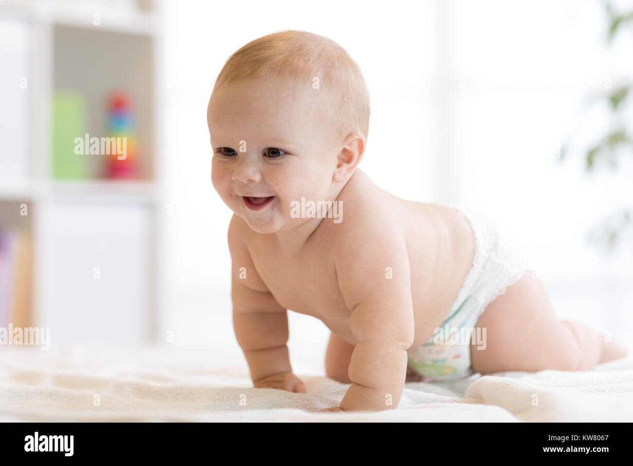 pretty crawling baby Stock Photo - Alamy
