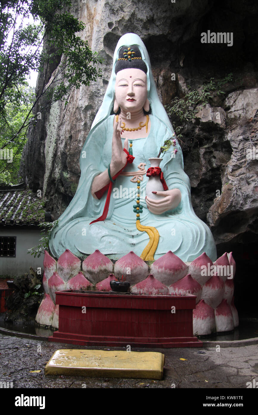 Chinese goddess Guan Yin near rock in Yanshuo, China Stock Photo - Alamy
