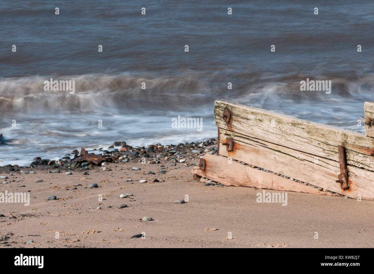 The incoming tide and waves having their energy dissipated by the ...