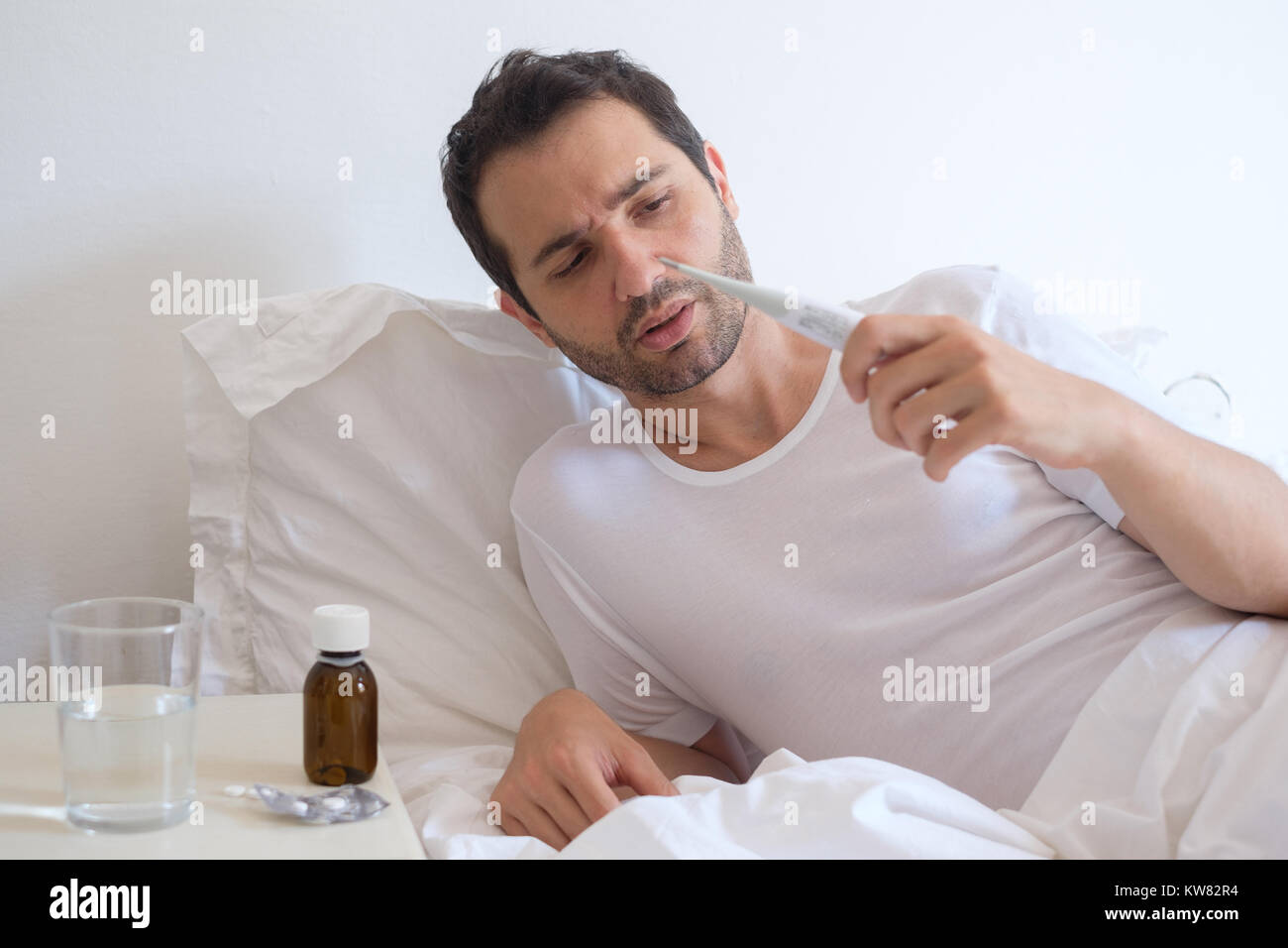 Very sick in bed fever hi-res stock photography and images - Alamy