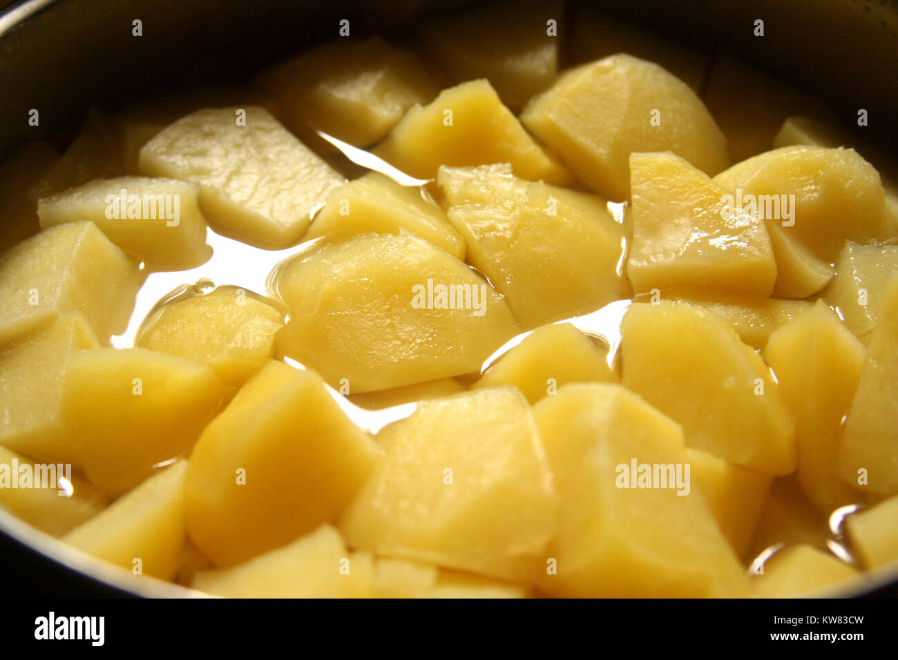 Potatoes boiled in pot Stock Photo - Alamy