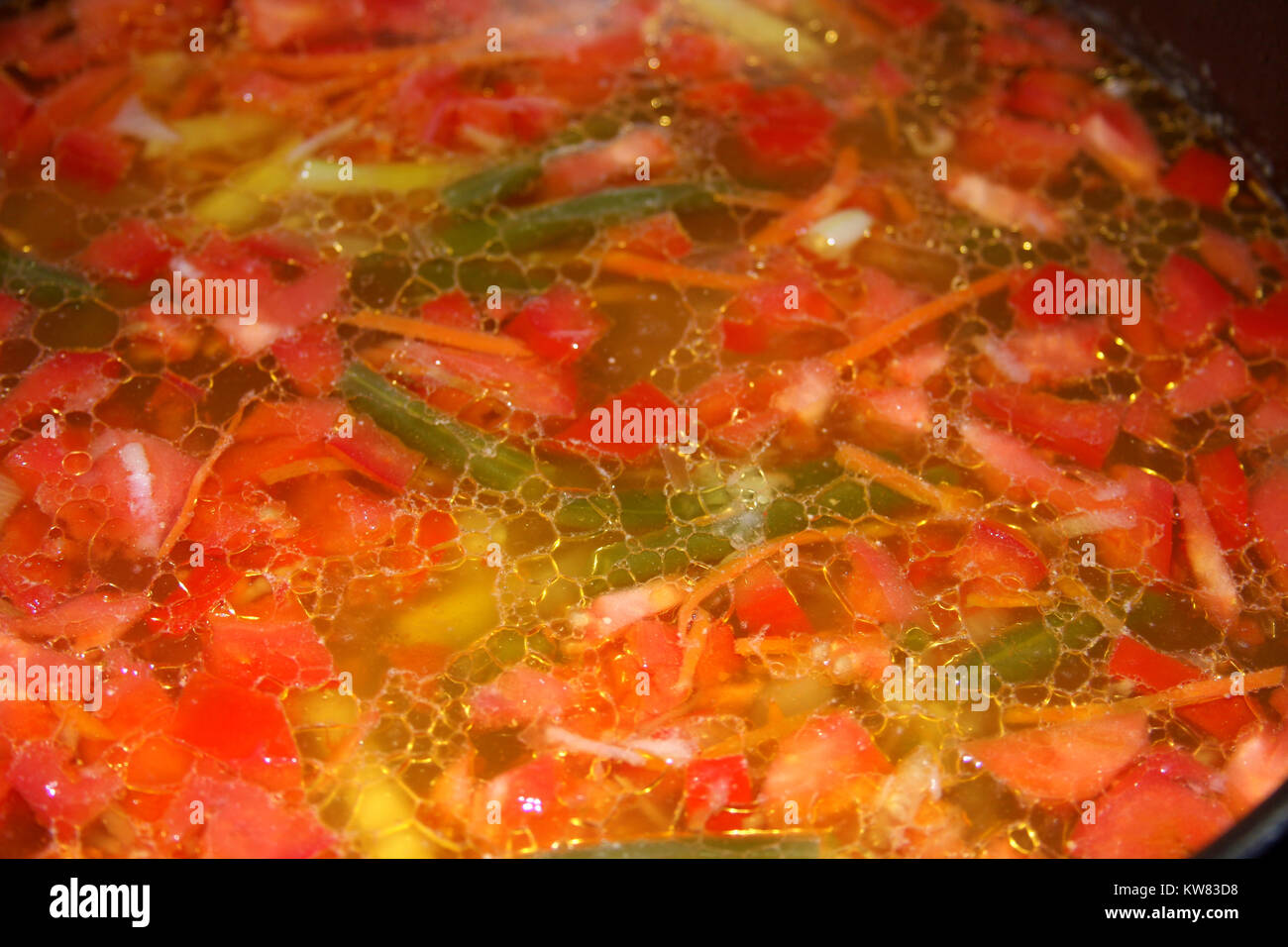 Pot of vegetables boiling for a soup Stock Photo - Alamy