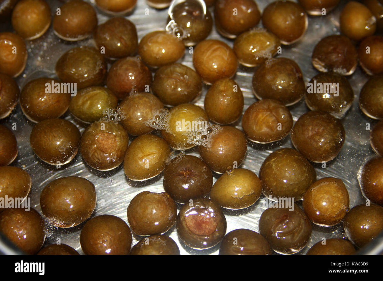 Sour liquid obtained from boiled sour fruits (cherry plums Stock Photo ...