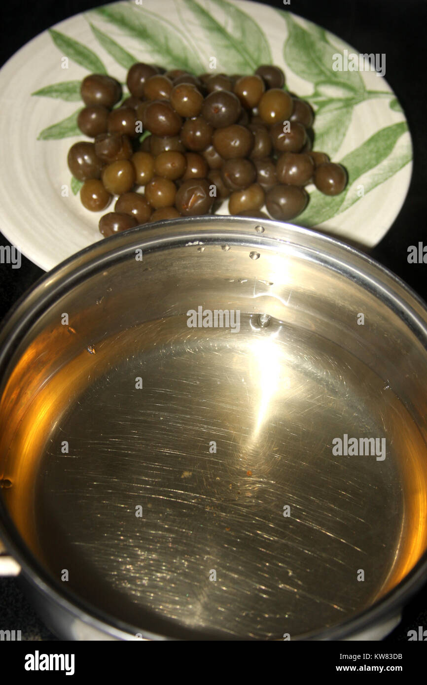Sour liquid obtained from boiled sour fruits (cherry plums Stock Photo ...