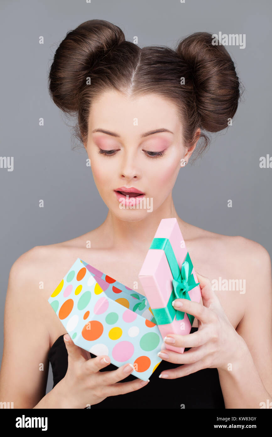 Beautiful Girl with Gift Stock Photo - Alamy