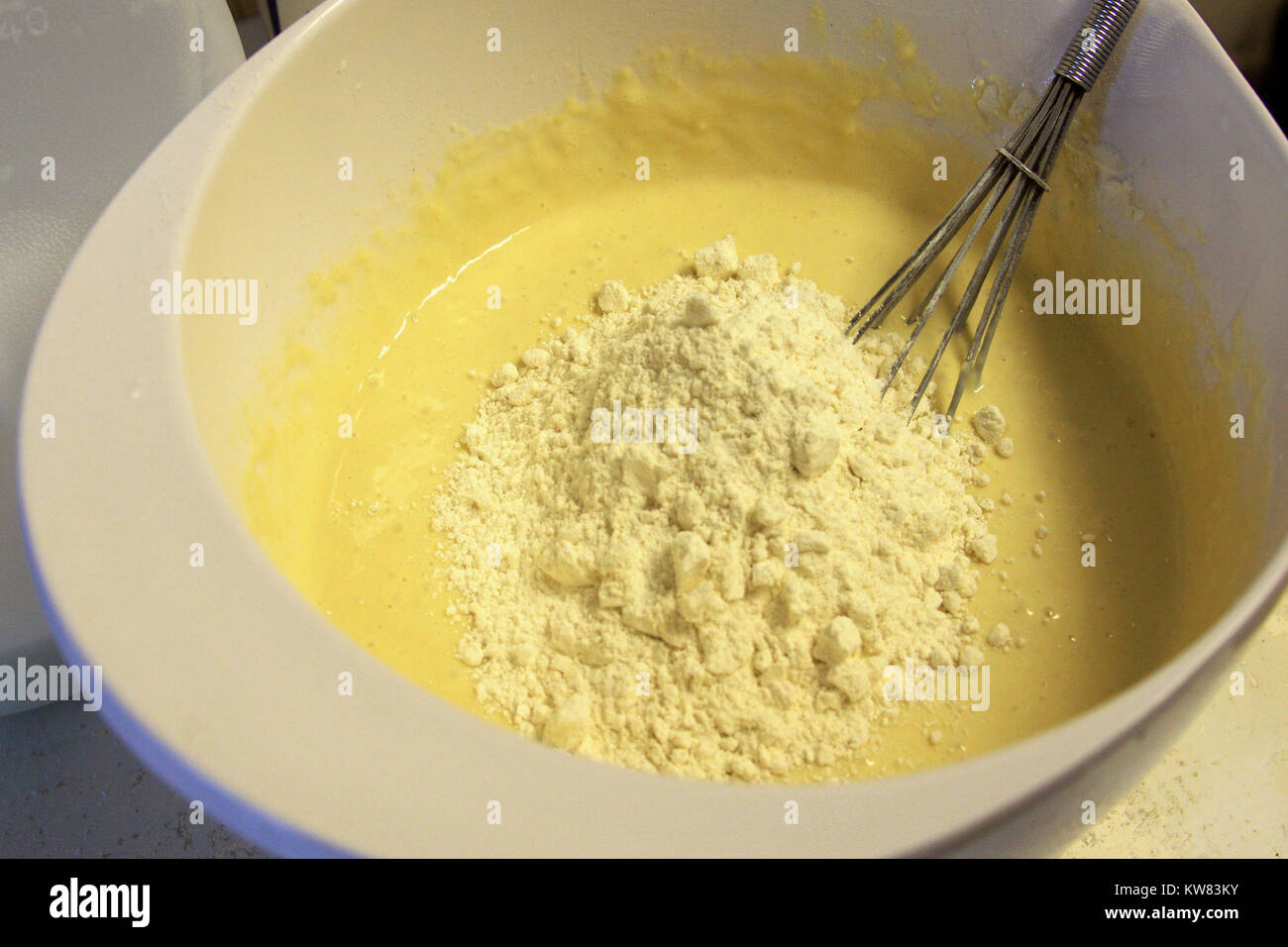 Mixing a batter Stock Photo - Alamy