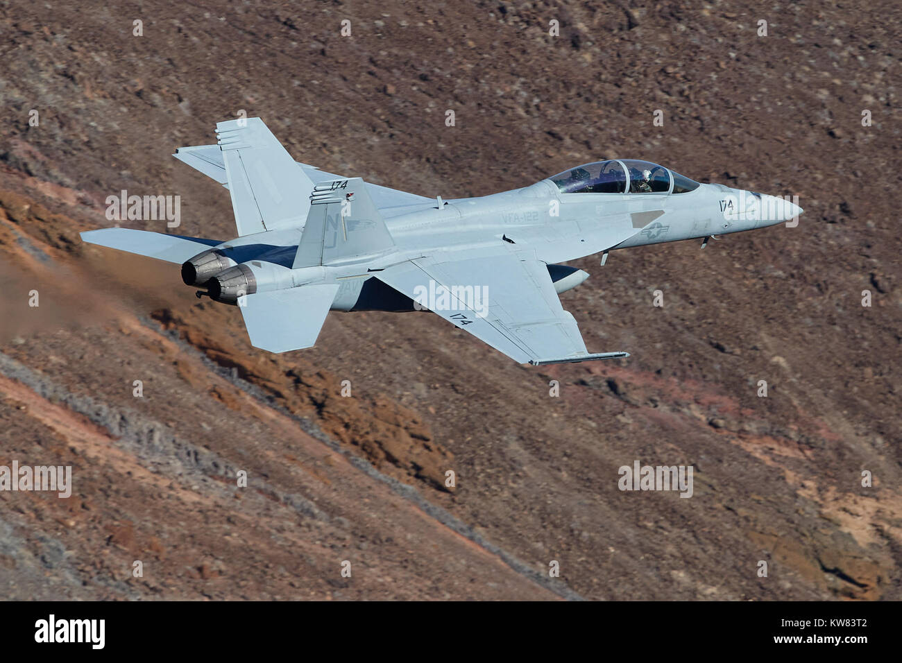 US Navy F/A-18F Super Hornet Fighter Jet, Flying At Low Level Through ...