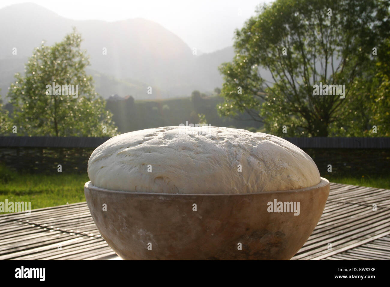 Bread dough left to rise outside in the heat Stock Photo - Alamy