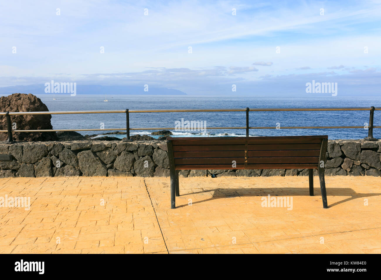 Bench in front of the sea Stock Photo - Alamy