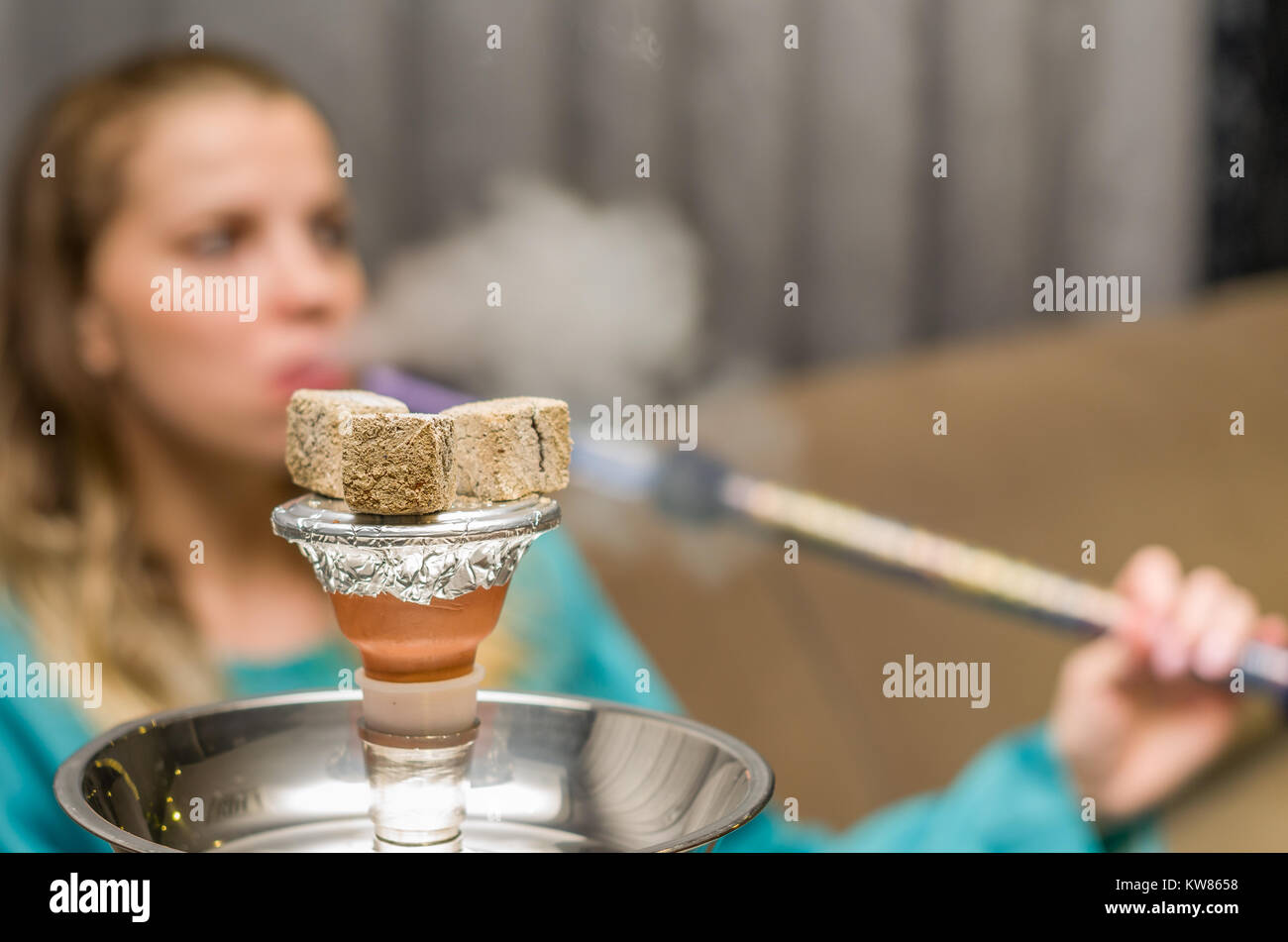 Woman smoking traditional Hookah (Narguile, Shisha, Chicha, Arguile ...