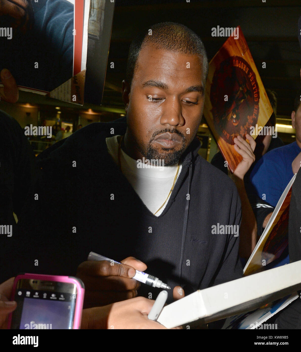 MIAMI, FL - APRIL 22: Kanye West arrives at Miami International Airport ...