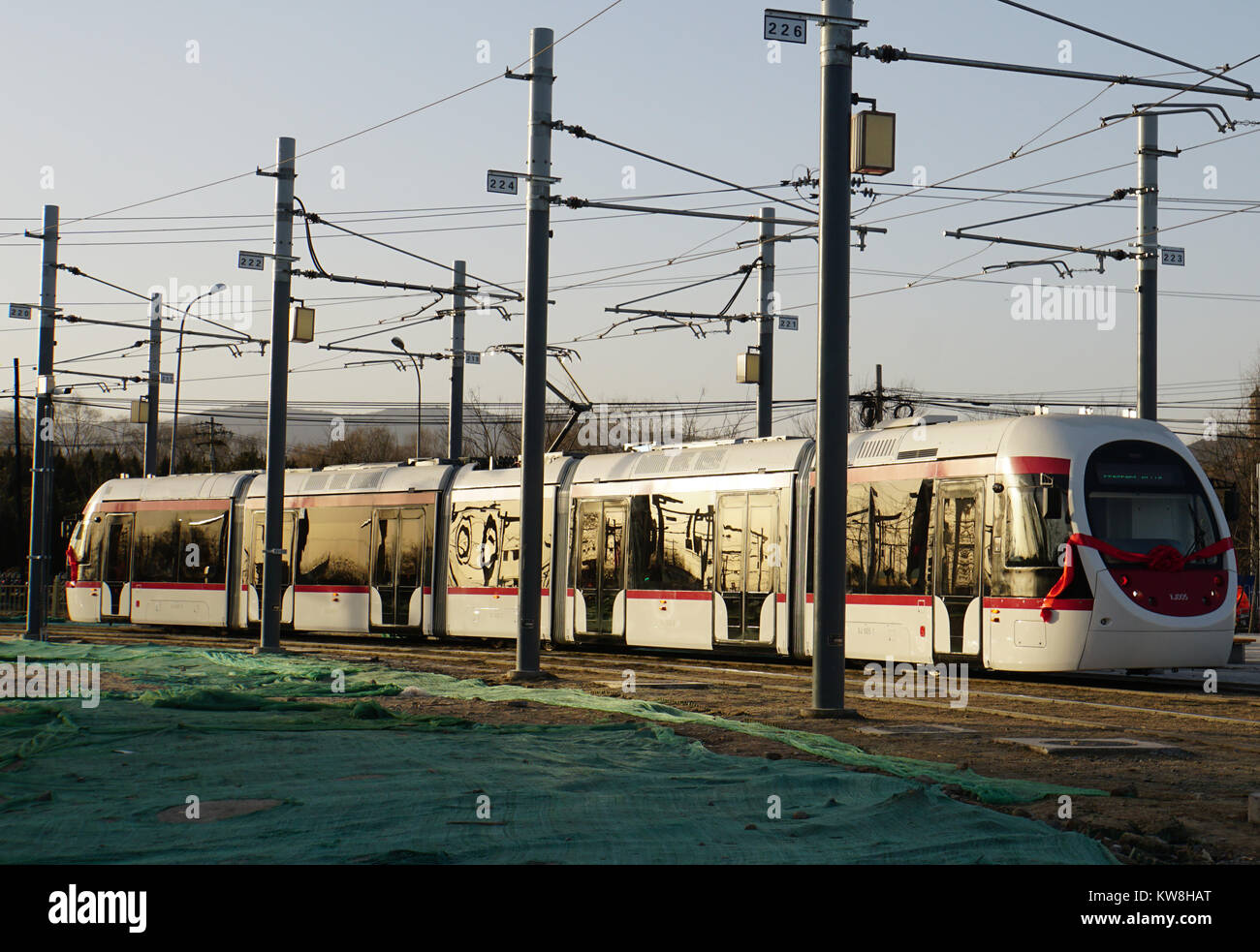 Beijing, China. 31st Dec, 2017. A tram runs on West Suburb Line in ...