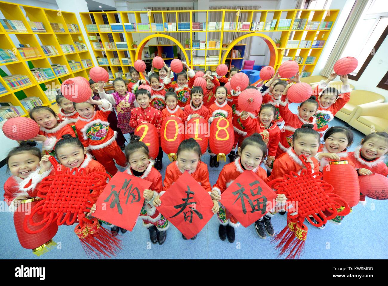 Shijiazhuang. 31st Dec, 2017. Primary school students wearing ...