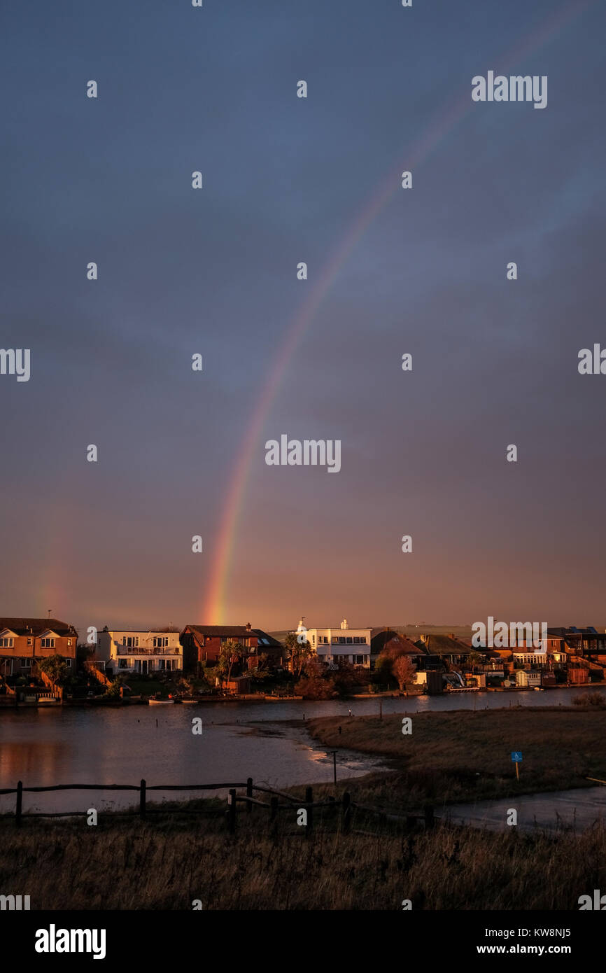 Lancing near Brighton, UK. 31st Dec, 2017. A beautiful rainbow appears ...