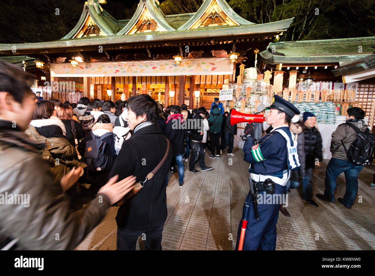Japan, Nishinomiya shrine. Shogatsu, New year, night-time. Hundreds of ...
