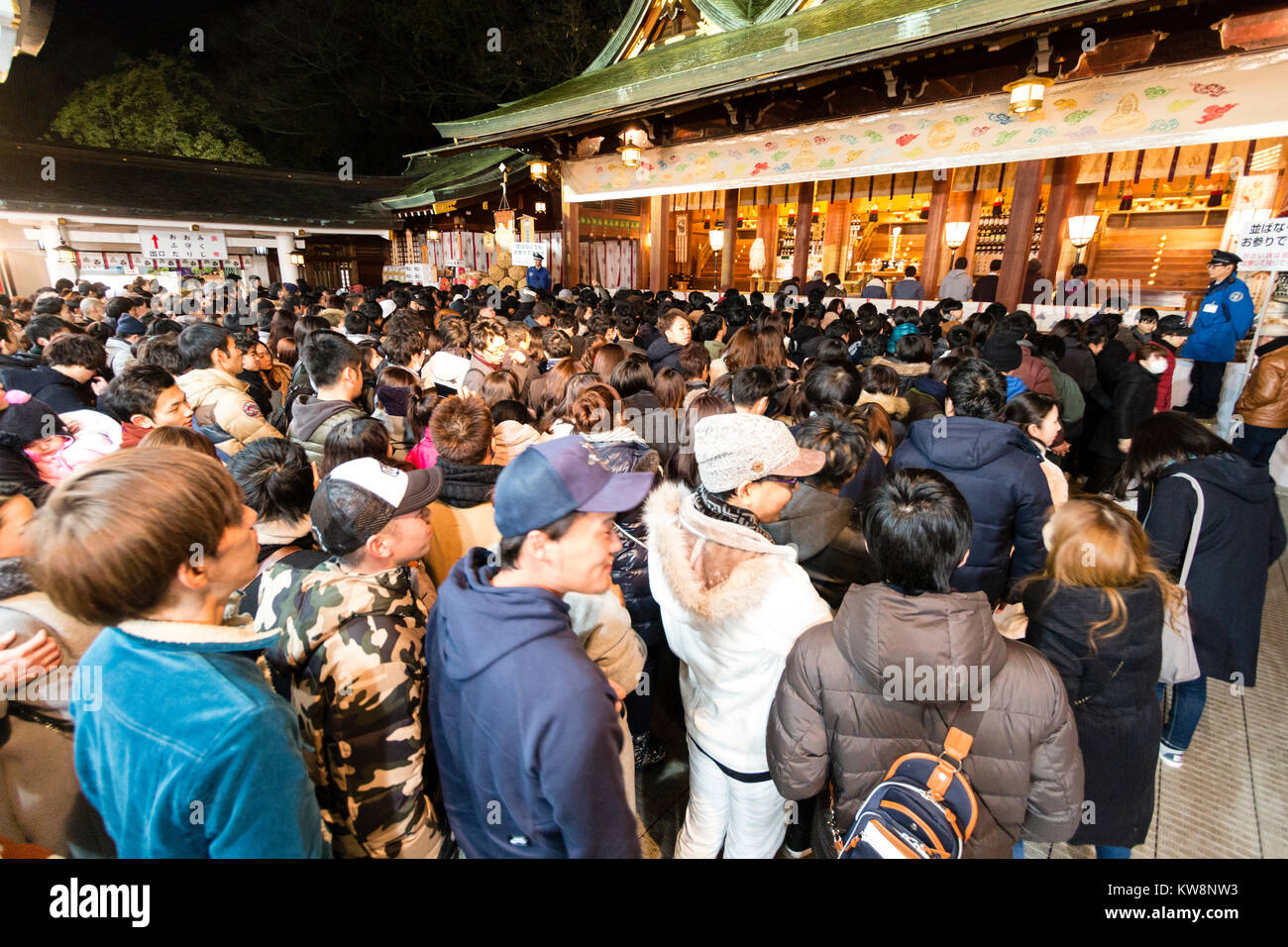 Japan, Nishinomiya shrine. Shogatsu, New year, night-time. Hundreds of ...