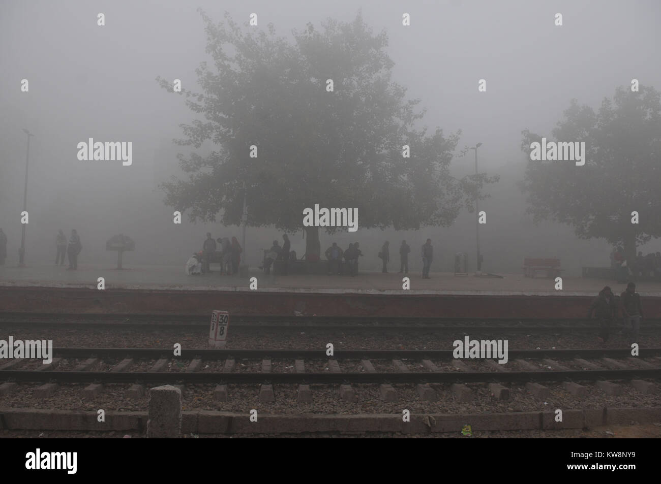 GURGAON, INDIA - DECEMBER 31: People were seen waiting at Gurgaon ...