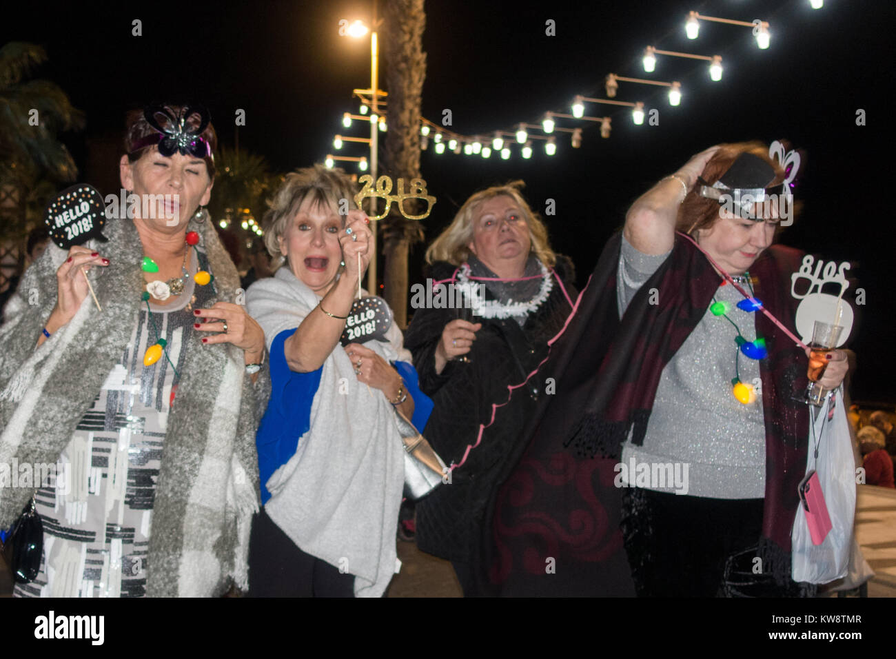 People celebrating the new year in Benidorm, Alicante province, Spain ...