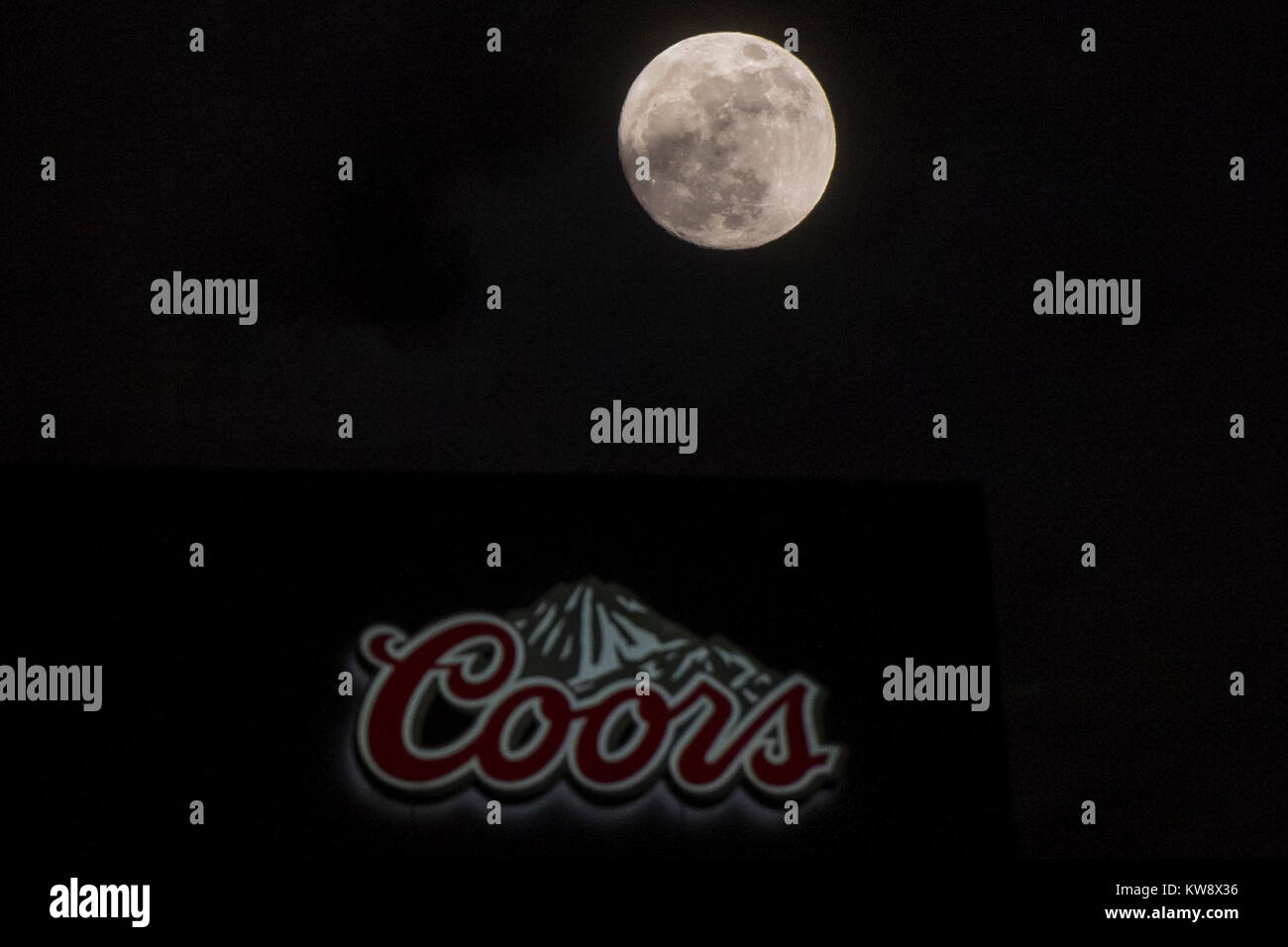 Chicago, USA. 31 December 2017. The full moon is seen behind the Miller ...