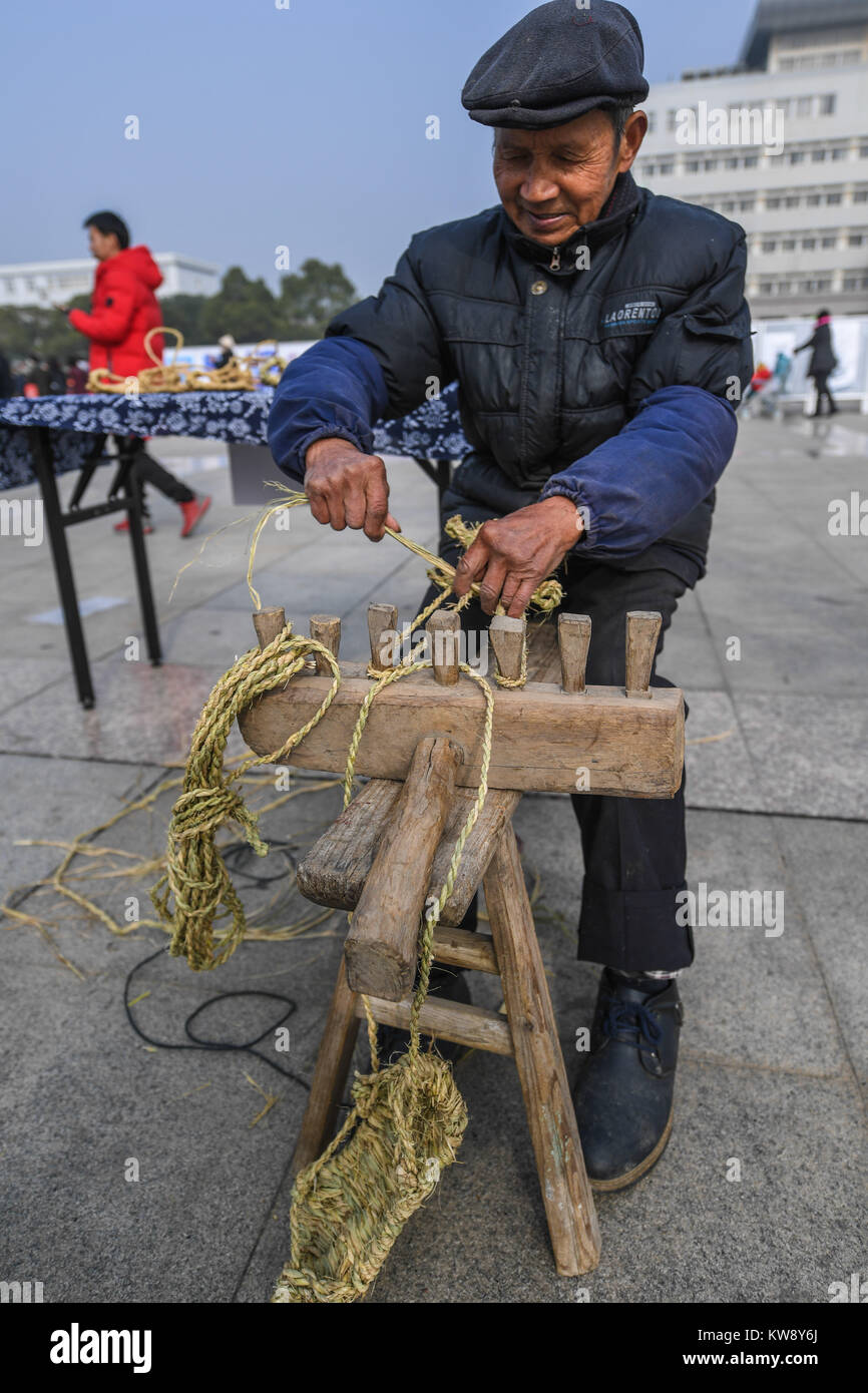 Tongxiang, China's Zhejiang Province. 1st Jan, 2018. A craftsman shows ...