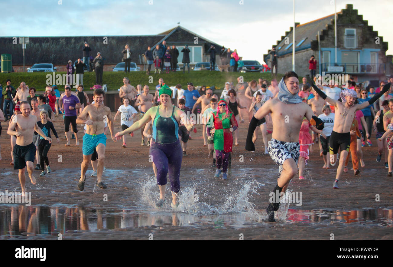 St. Andrews, Fife, Scotland, UK. 1st Jan, 2018. People run into The ...