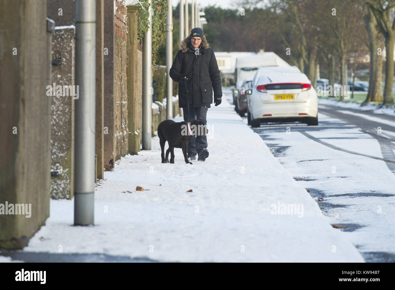 Northern Scotland is hit by snow fall and below freezing temperatures ...