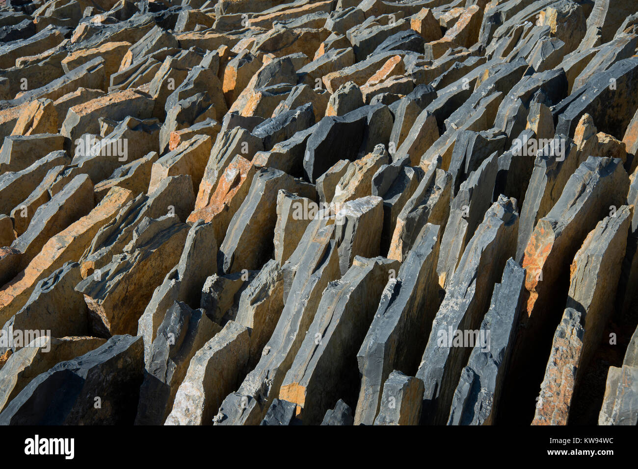 Building a rock rack garden in the city Stock Photo - Alamy