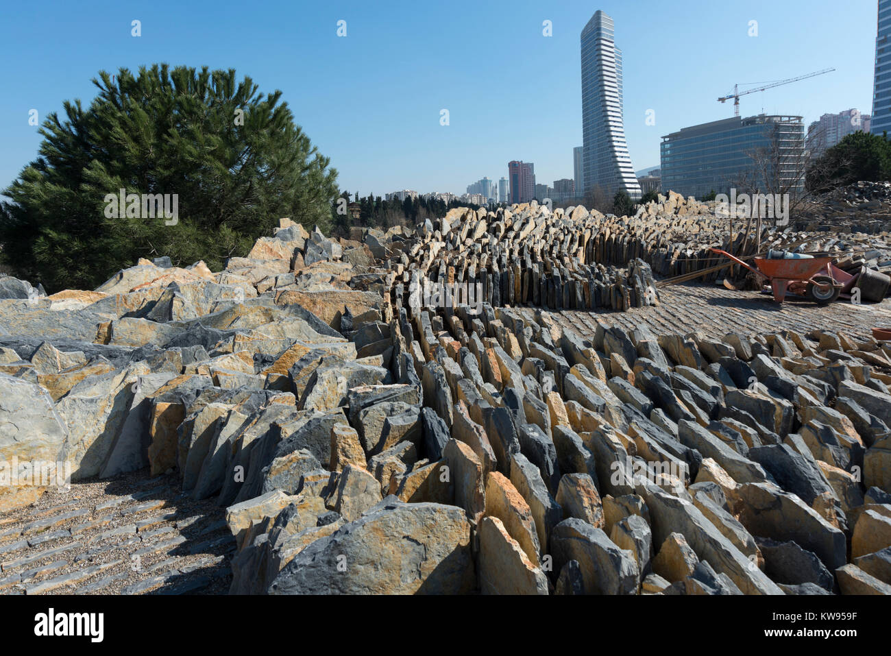 Building a rock rack garden in the city Stock Photo - Alamy