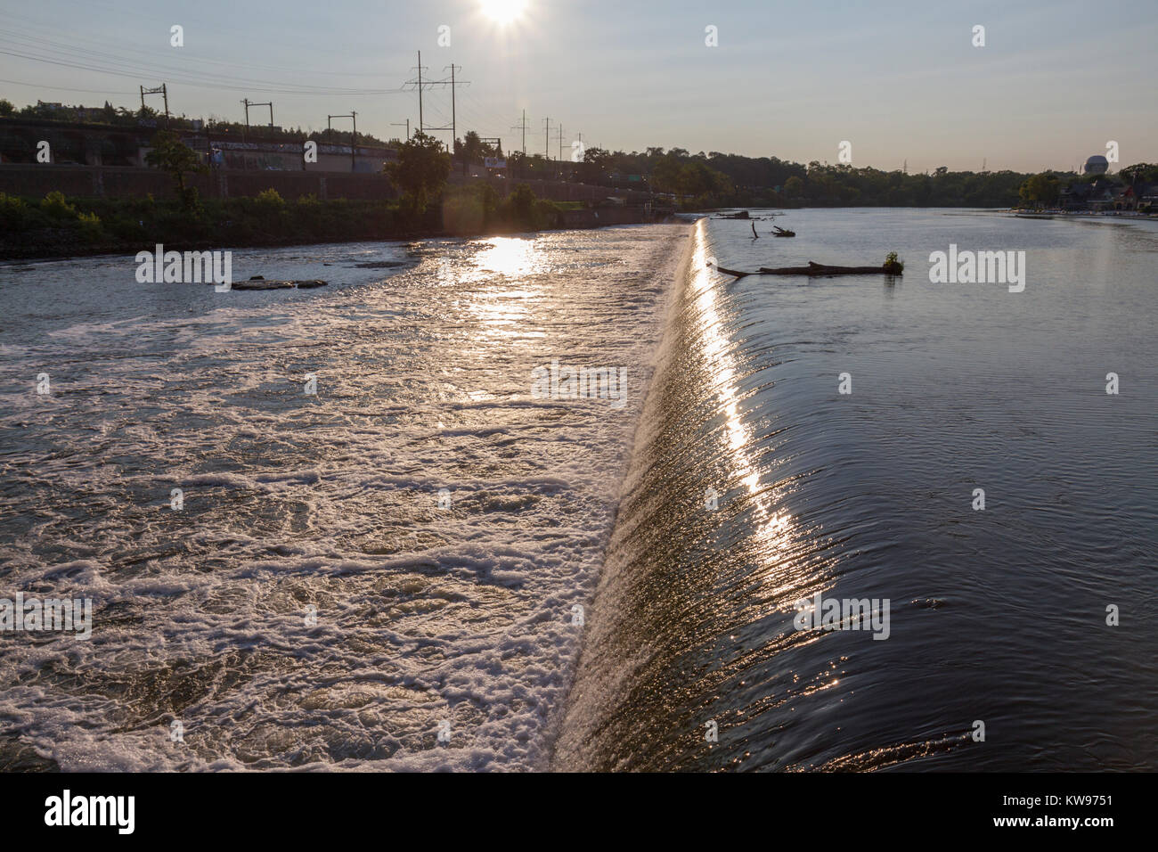 Water flowing over a sunlit Fairmont Dam, Schuylkill River ...