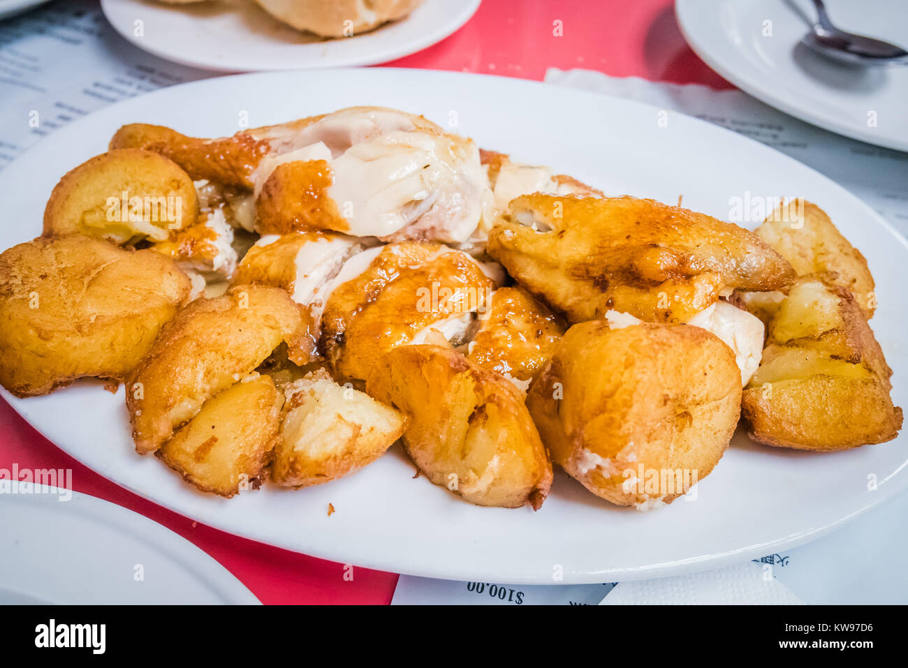 roasted half chicken dish Stock Photo - Alamy