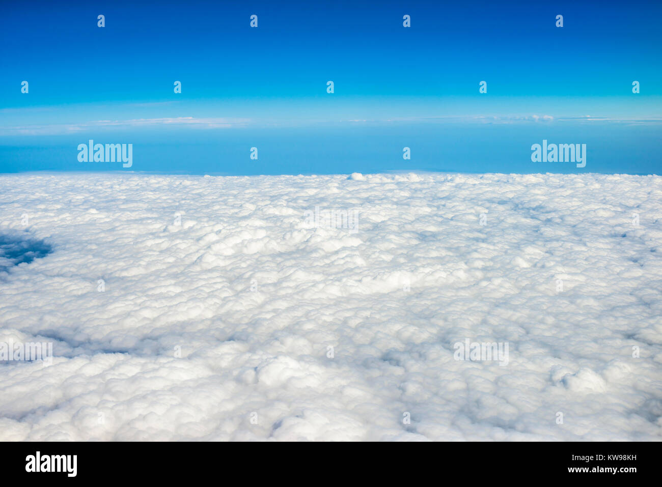 View above clouds from an airplane point of view Stock Photo - Alamy