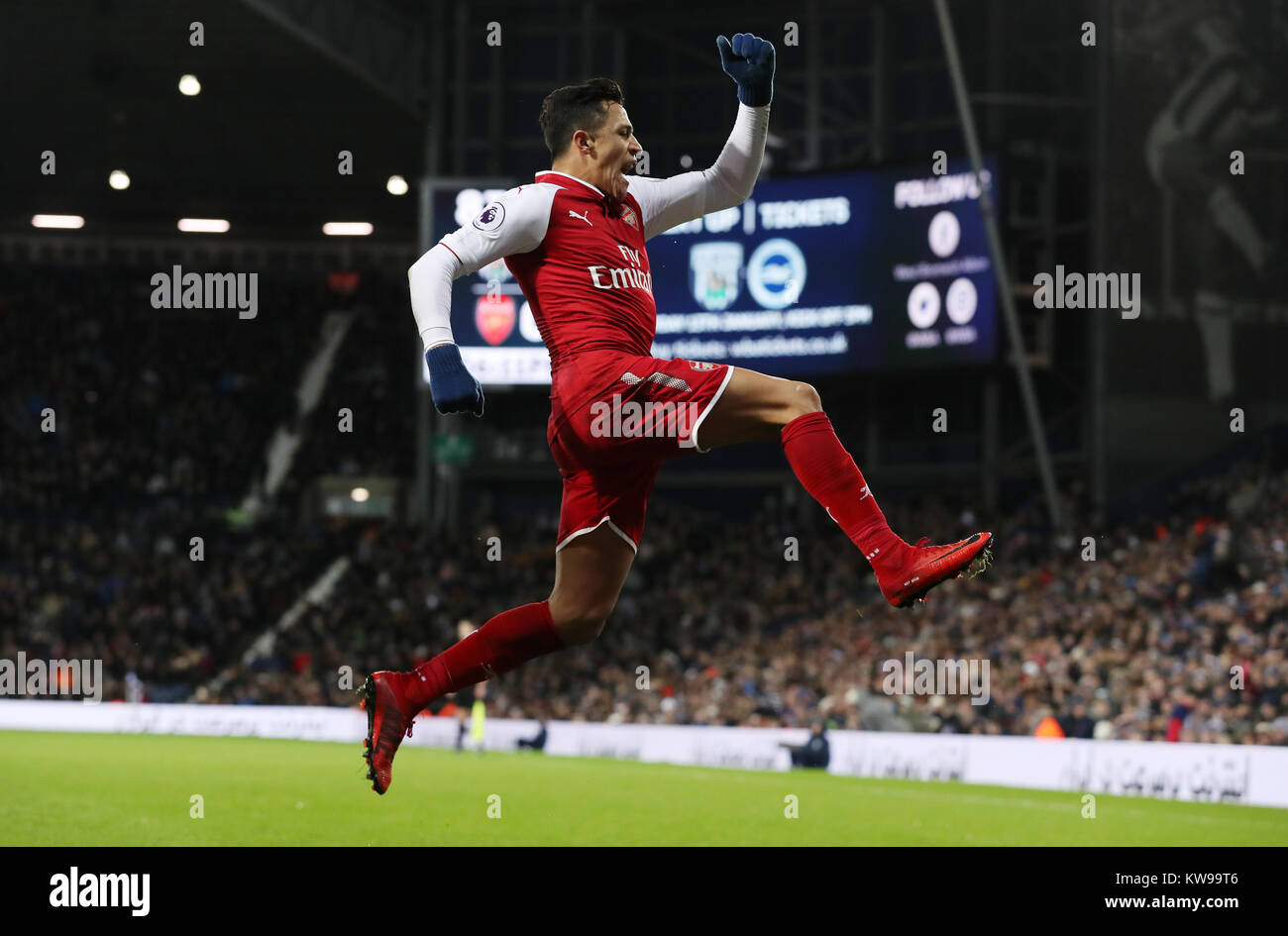 Arsenal's Alexis Sanchez celebrates scoring his side's first goal of ...