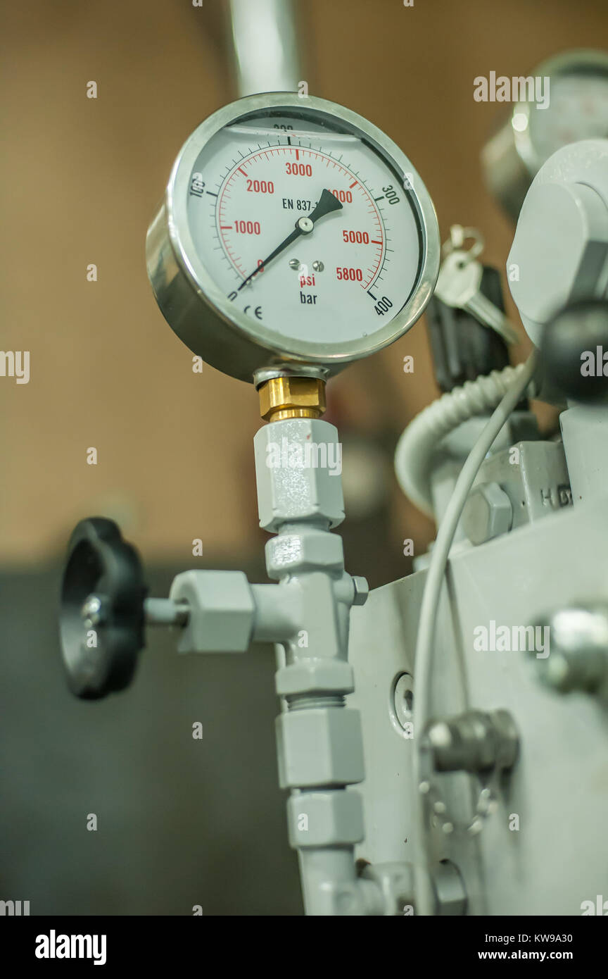 Close up of machine valve system measure indicator for monitoring ...