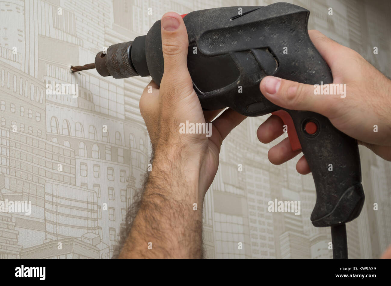Great concept of residential renovation, drill boring wall Stock Photo ...