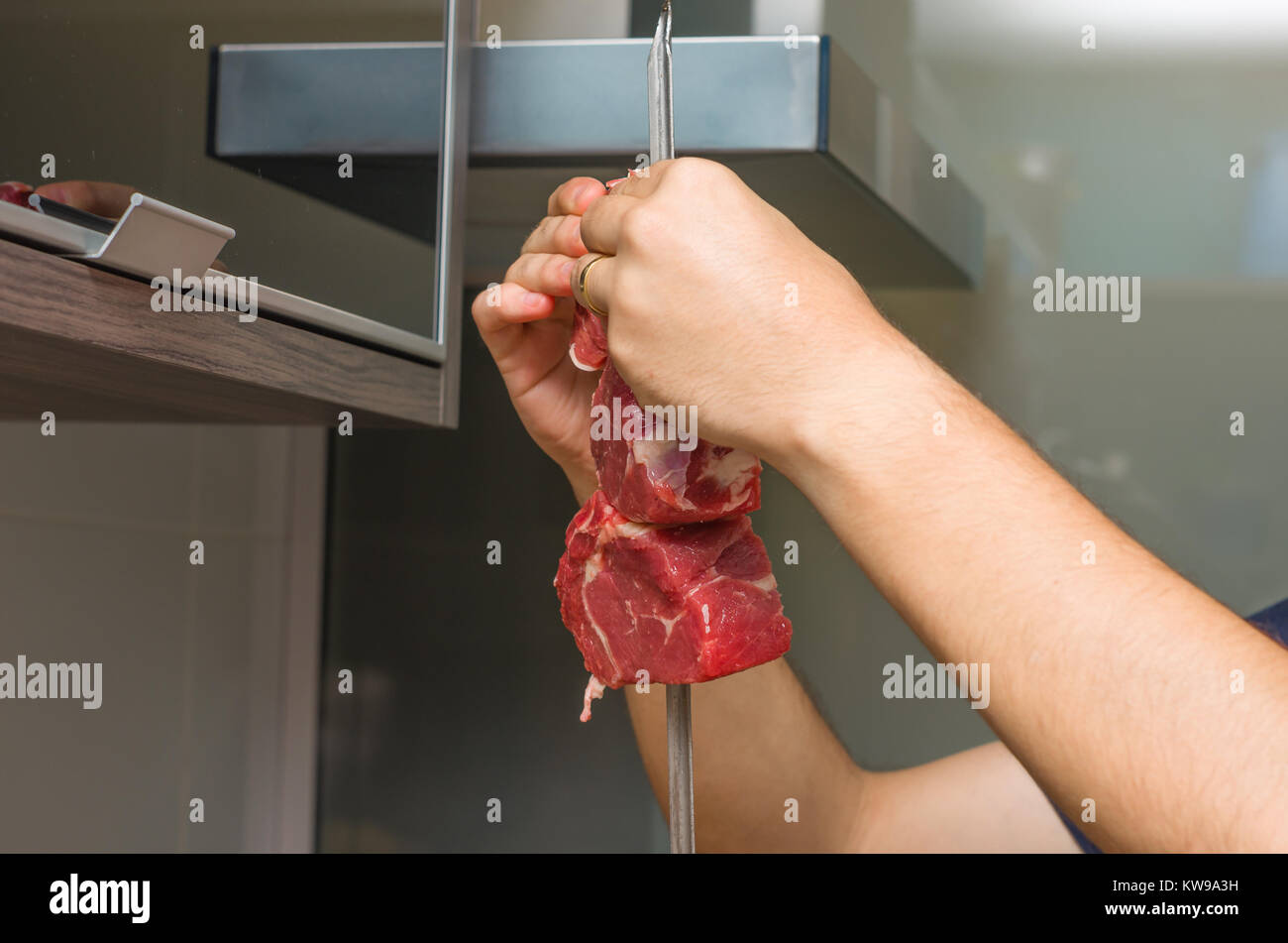 Barbecue Brazilian gaucho, raw beef spit Stock Photo - Alamy