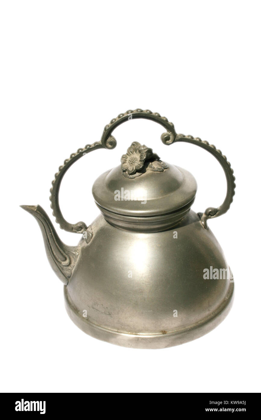 Beautiful decorated antique silver pot at the white background Stock ...