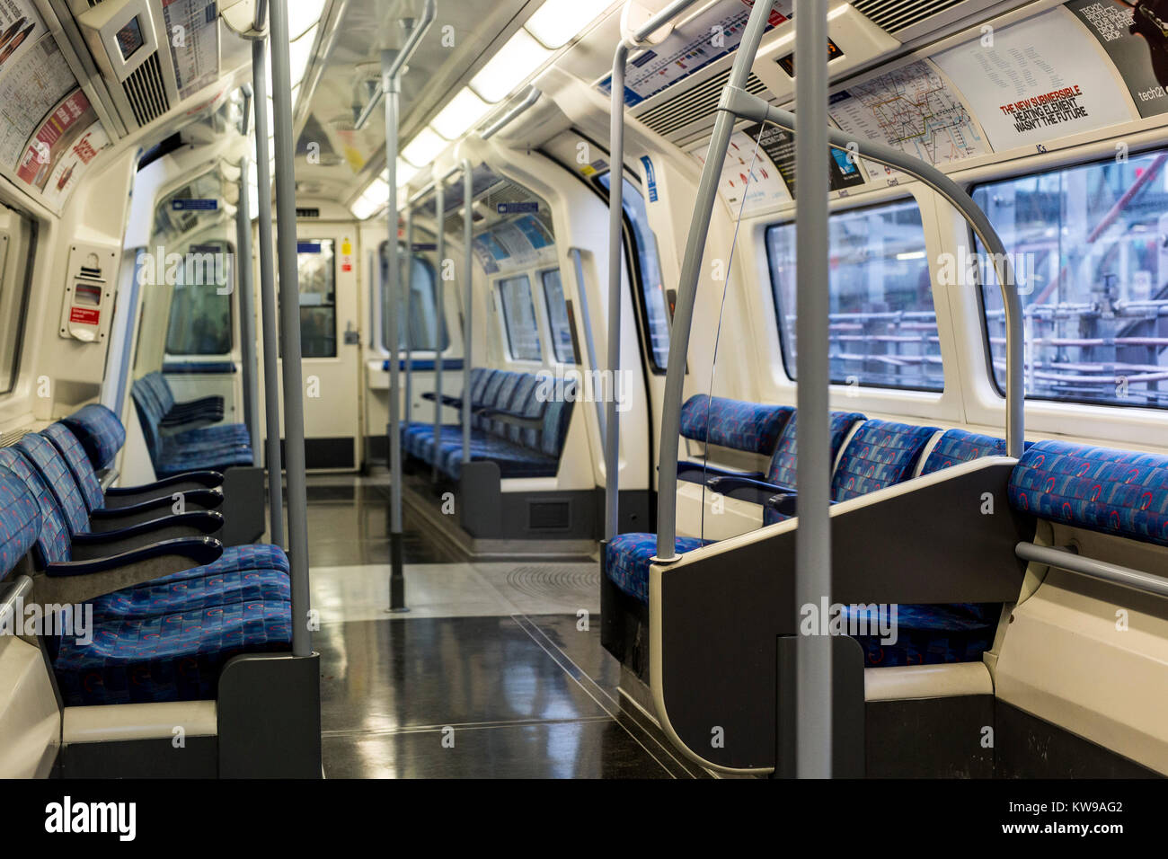 Interior of refurbished Jubilee Line trains with grey bars Stock Photo ...