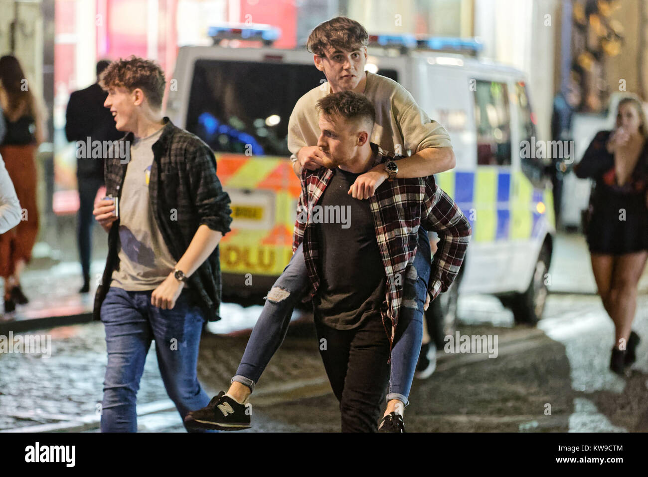 A man gets a piggy back ride Stock Photo - Alamy