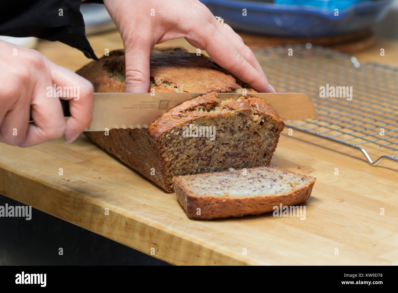 slicing home made banana bread Stock Photo - Alamy