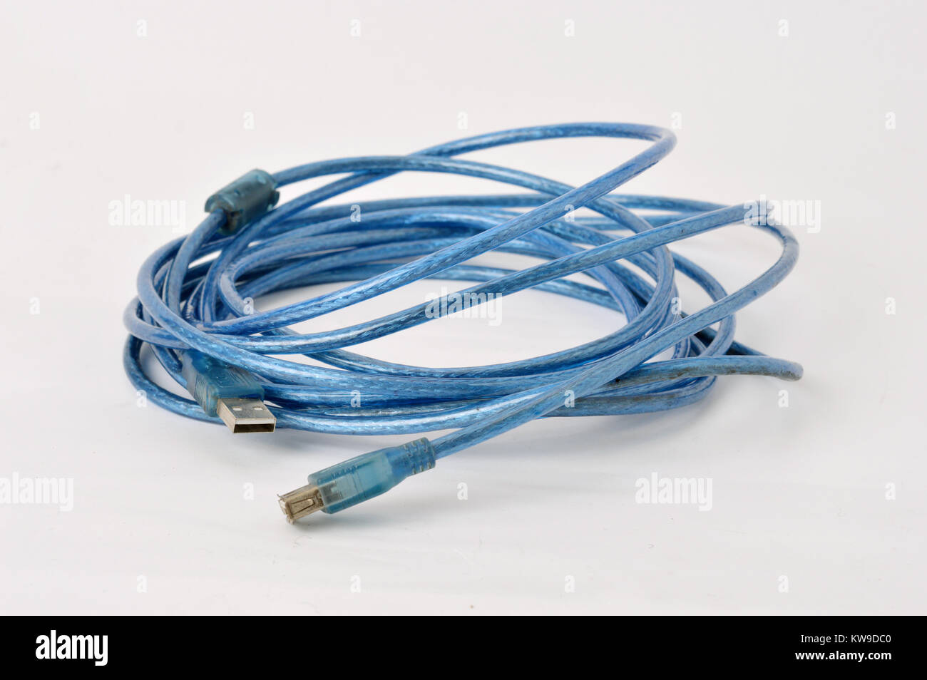 long blue usb cable on white background Stock Photo - Alamy