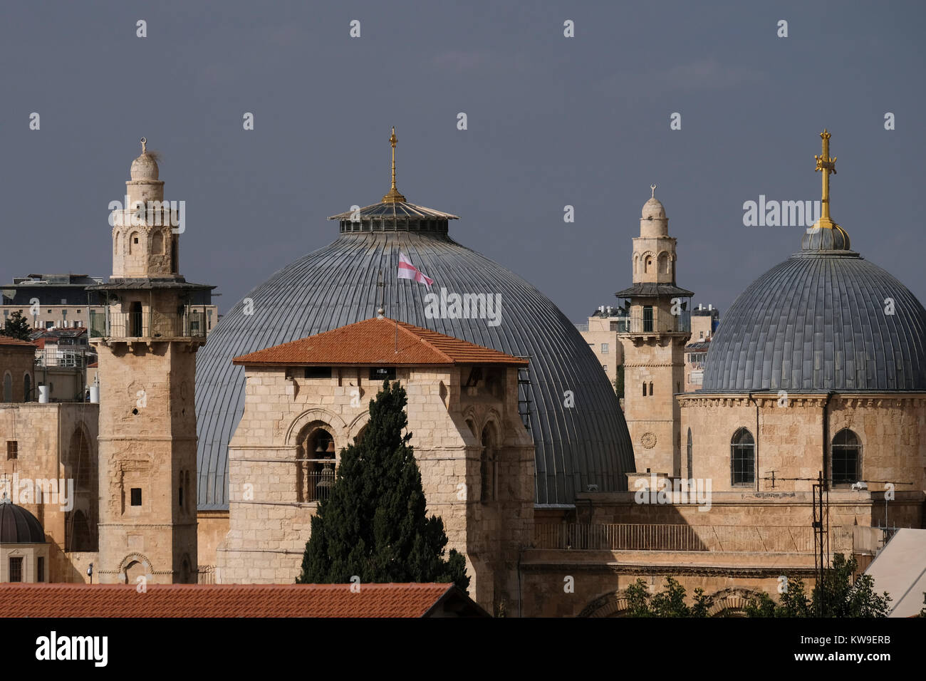 View of mosque minarets and dome of the Church of the Holy Sepulchre in ...