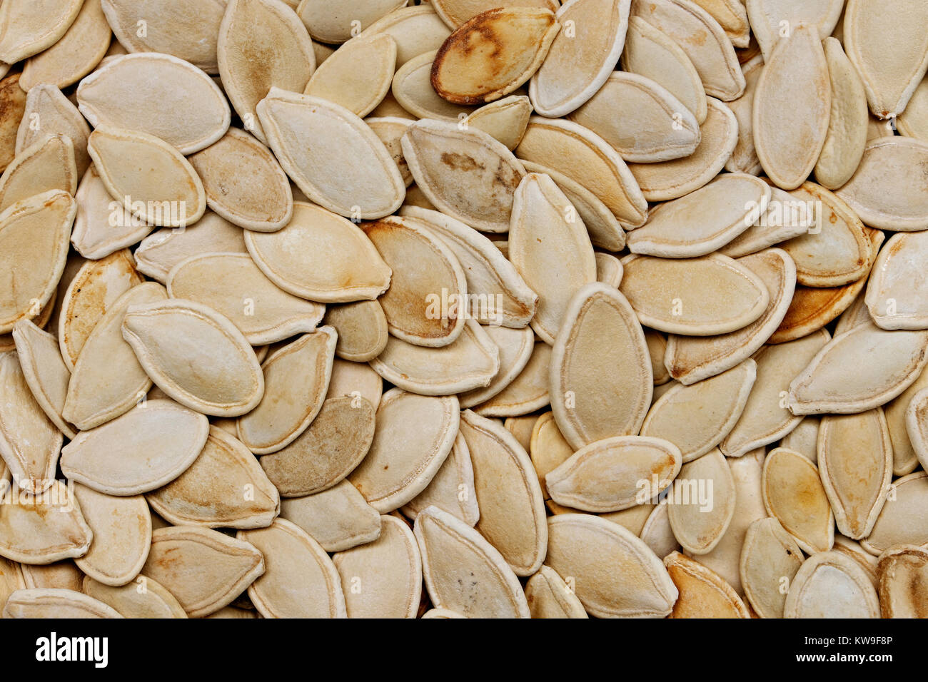 pumpkin seeds background Stock Photo - Alamy