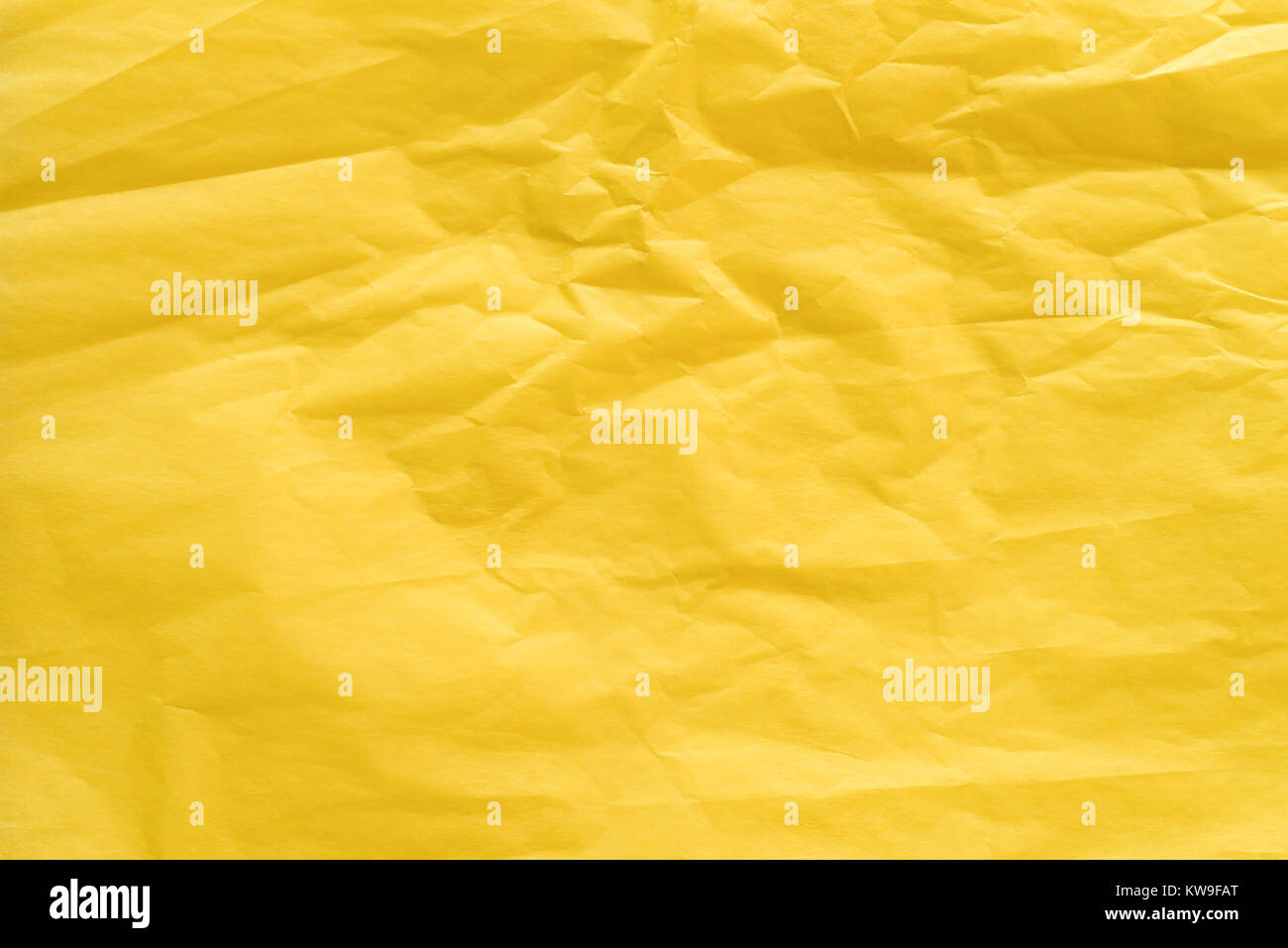 yellow color creased paper tissue background texture Stock Photo - Alamy