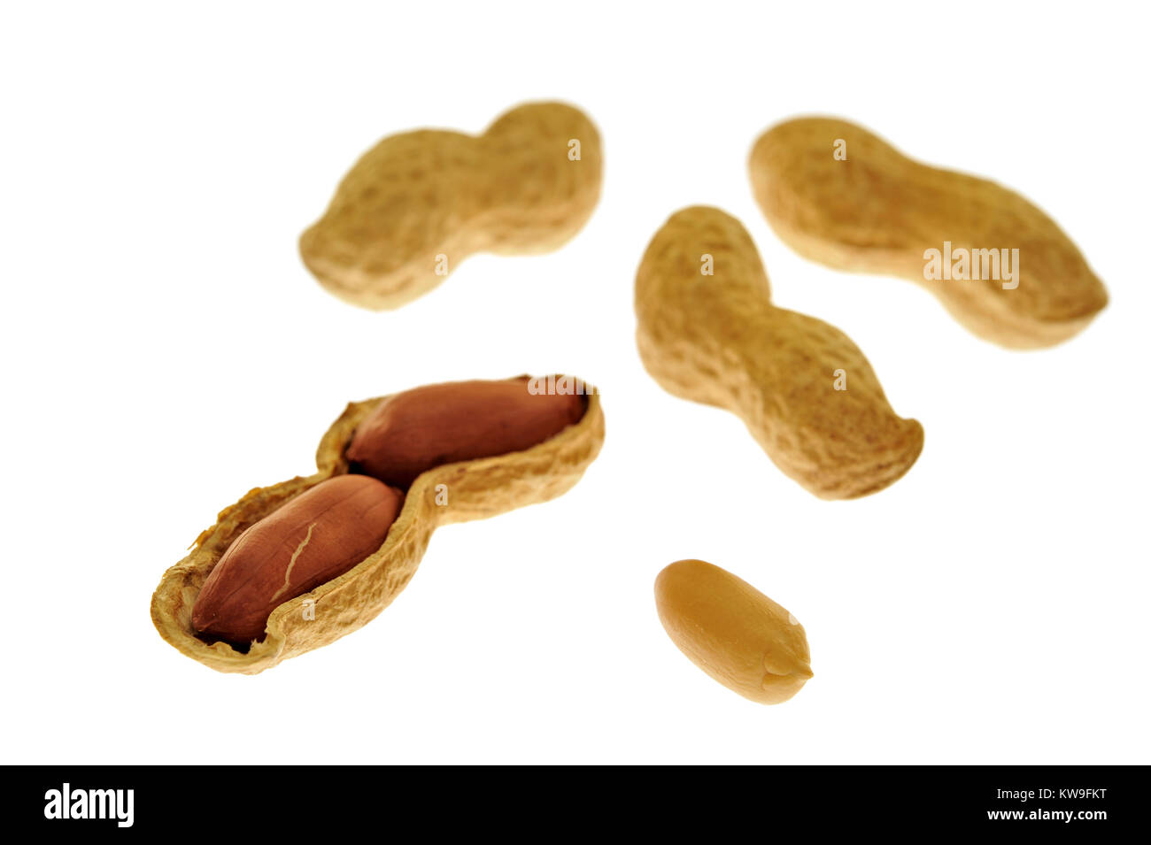 Peanuts isolated on white background Stock Photo - Alamy