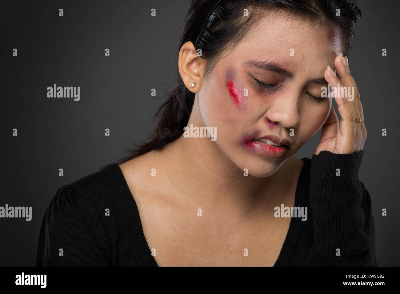 portrait of a asian woman victim of domestic abuse Stock Photo - Alamy
